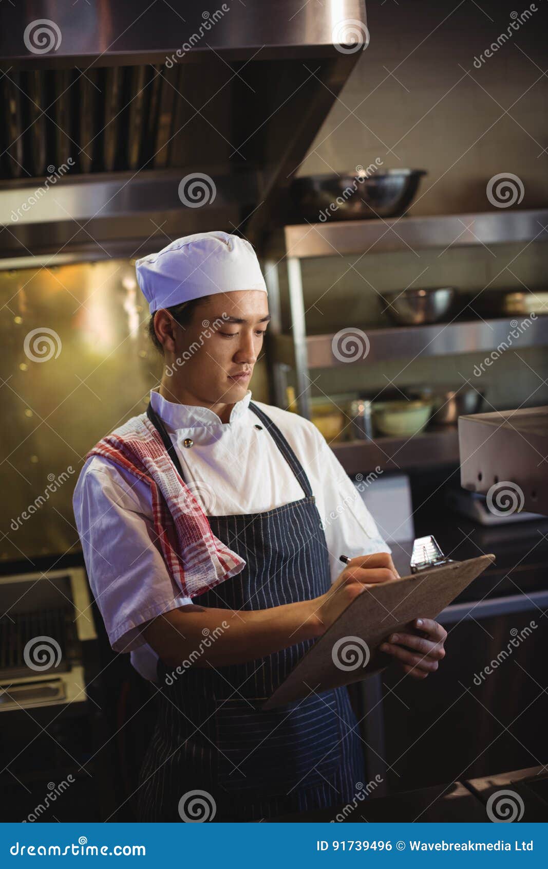 Chef Writing on a Clipboard Stock Photo - Image of profession, chef ...
