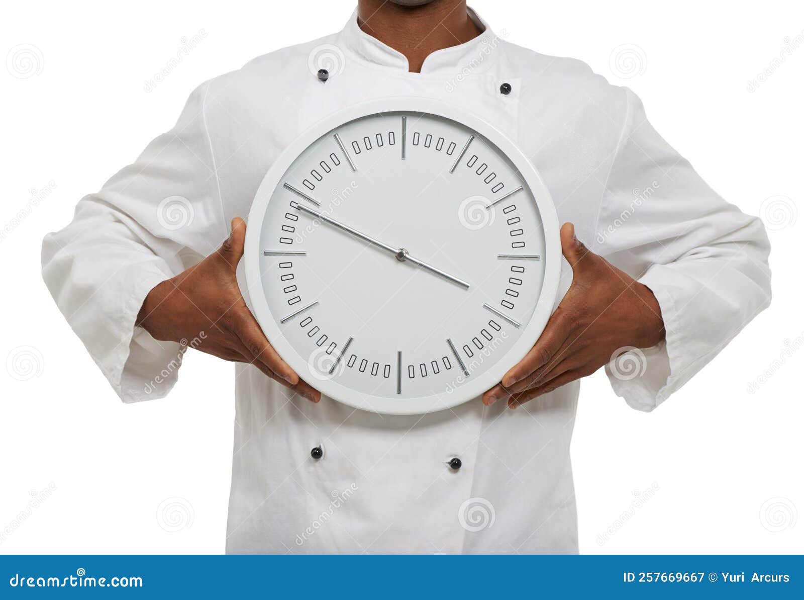 We Chefs are always on the Clock. Studio Shot of a Chef Holding a Clock ...