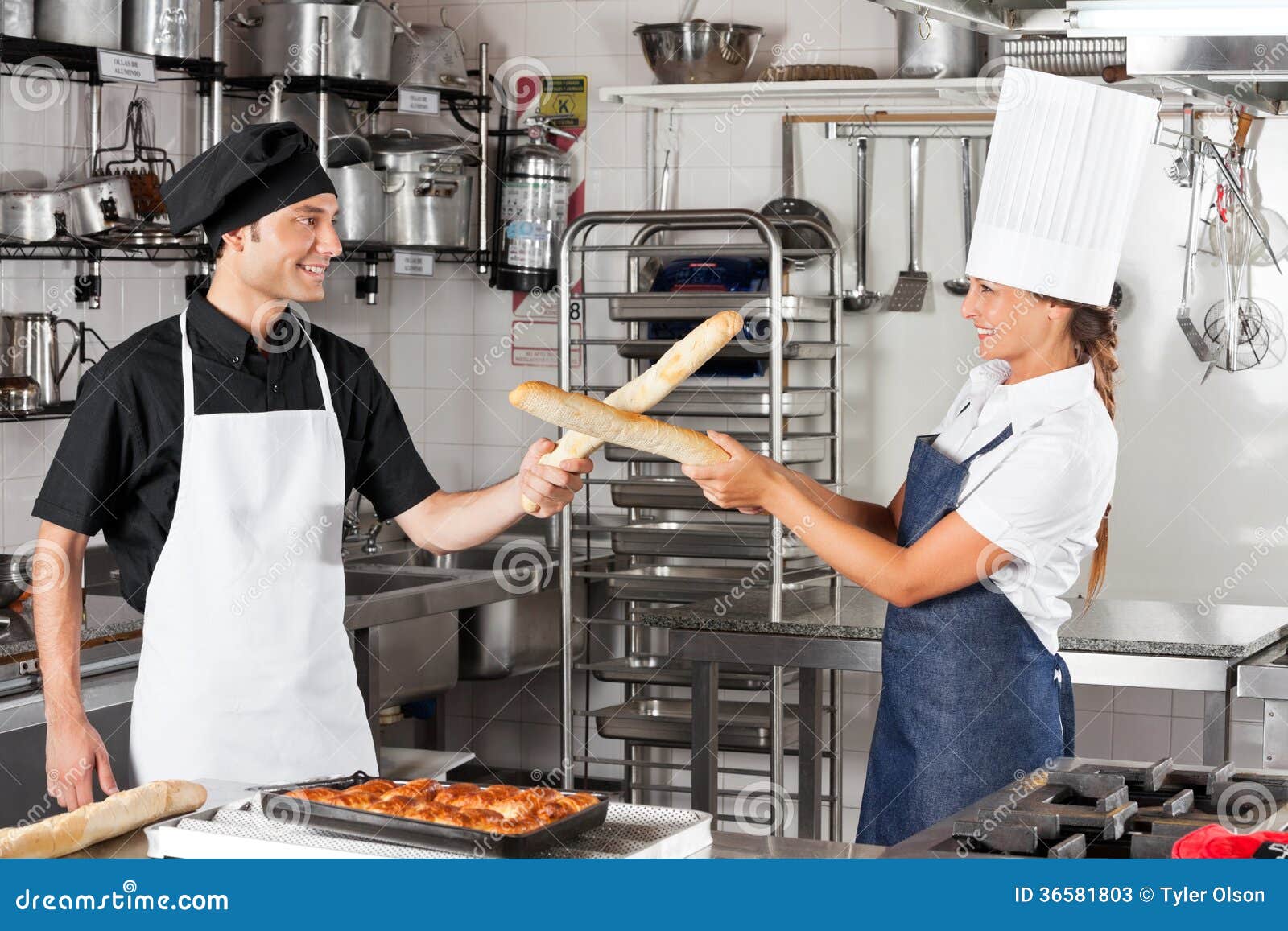 Chefs Fighting With Bread Loafs Stock Image - Image: 36581803