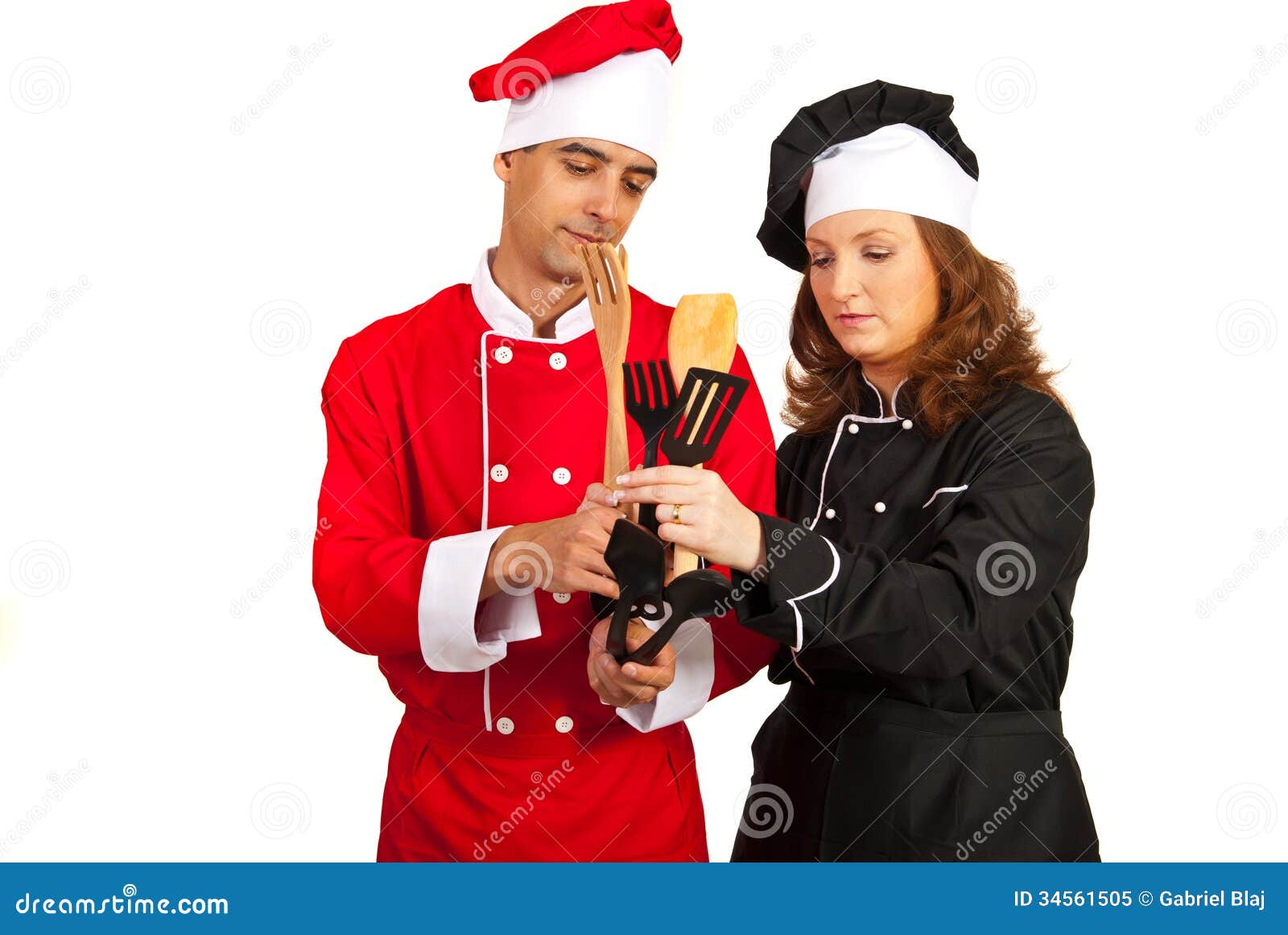 Chefs Giving Each Other Utensils Stock Image - Image of hotel, posing ...