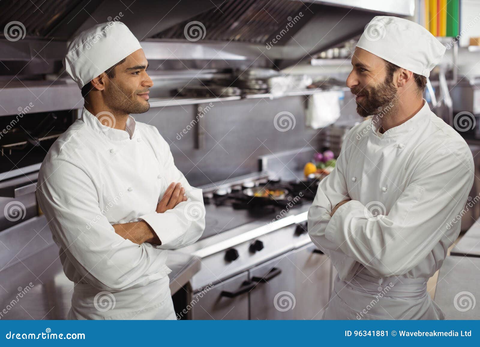 Chefs Interacting with Each Other in Kitchen Stock Image - Image of ...