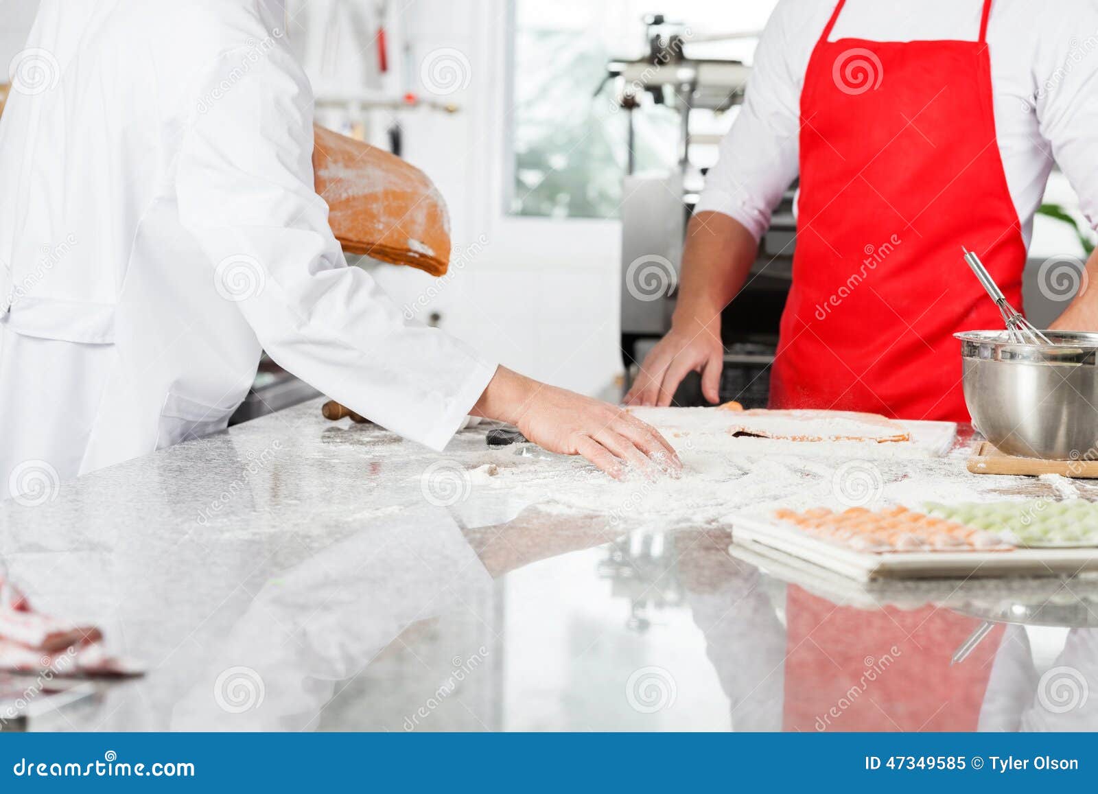 Chefs Preparing Ravioli Pasta at Counter Stock Image - Image of counter ...