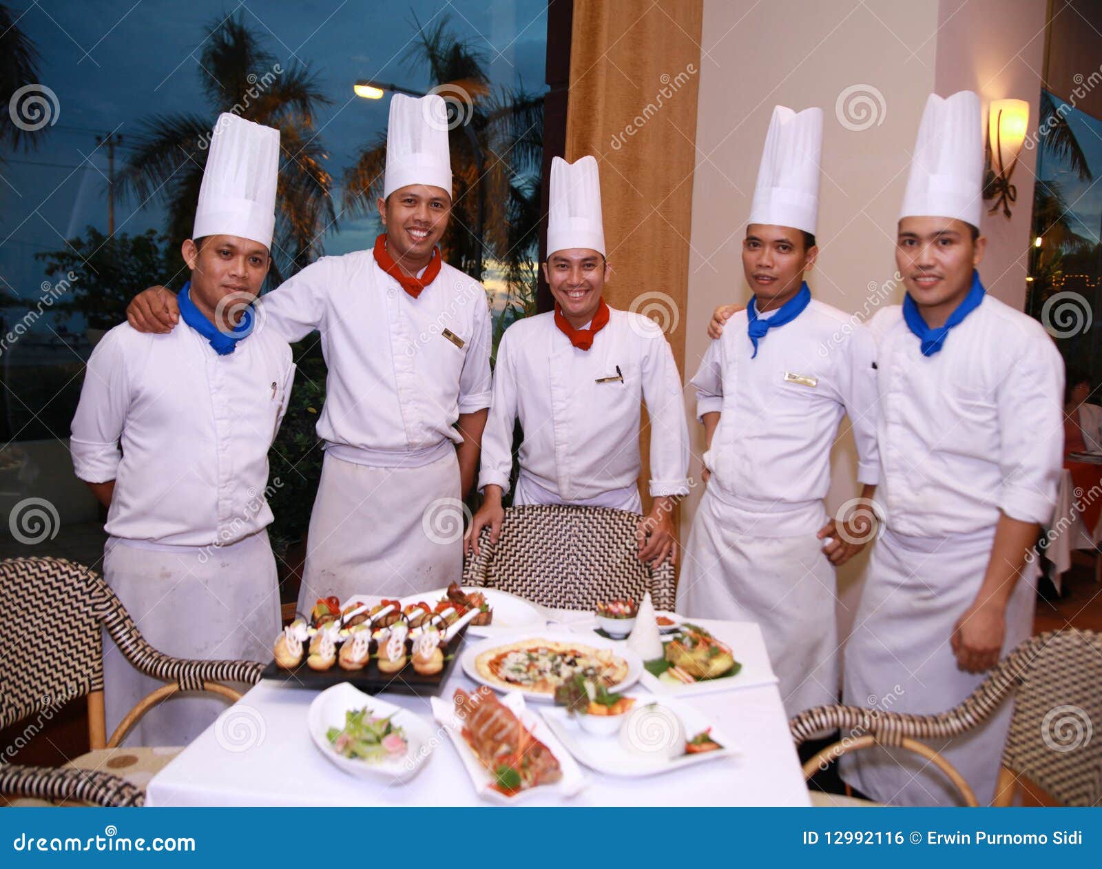 Chefs at restaurant stock photo. Image of restaurant - 12992116