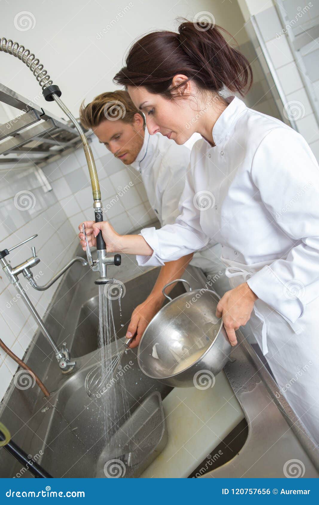 Chefs at sink washing up stock photo. Image of indoors - 120757656