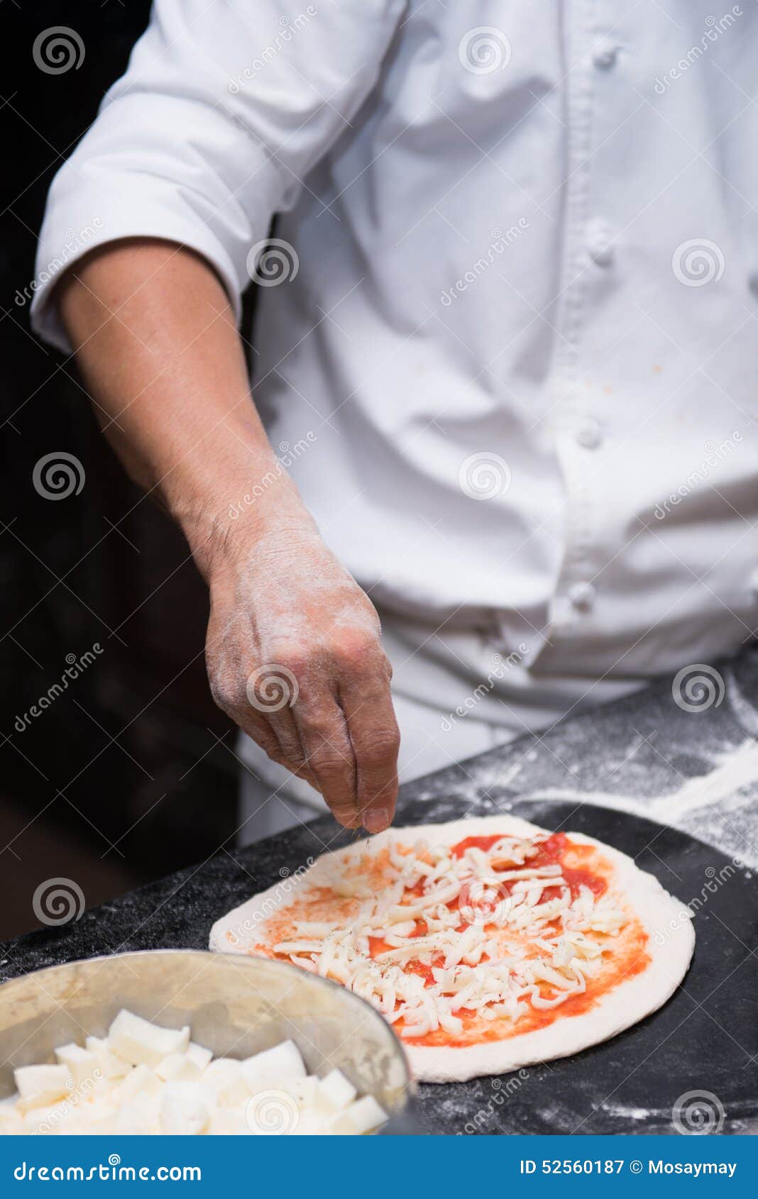 Chefs are Sprinkle Cheese Onto a Pizza Stock Image - Image of flavor ...