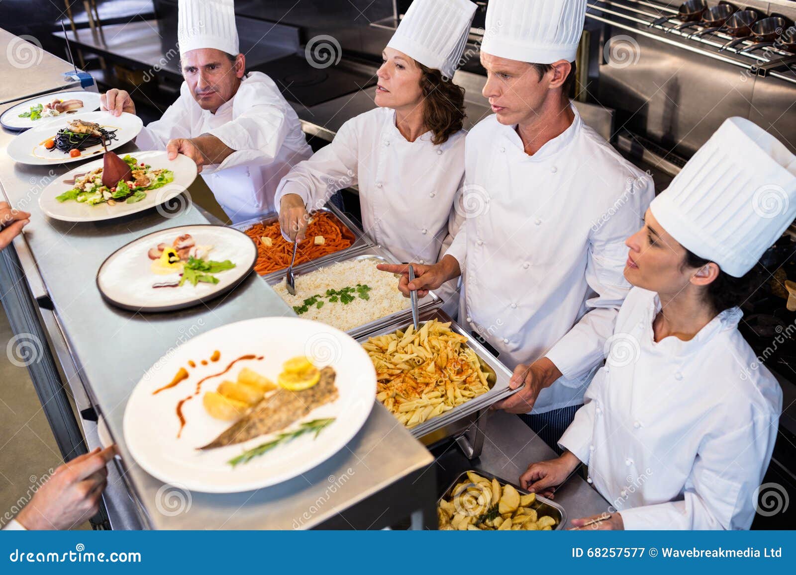 Chefs Standing at Serving Trays of Pasta Stock Image - Image of cookery ...