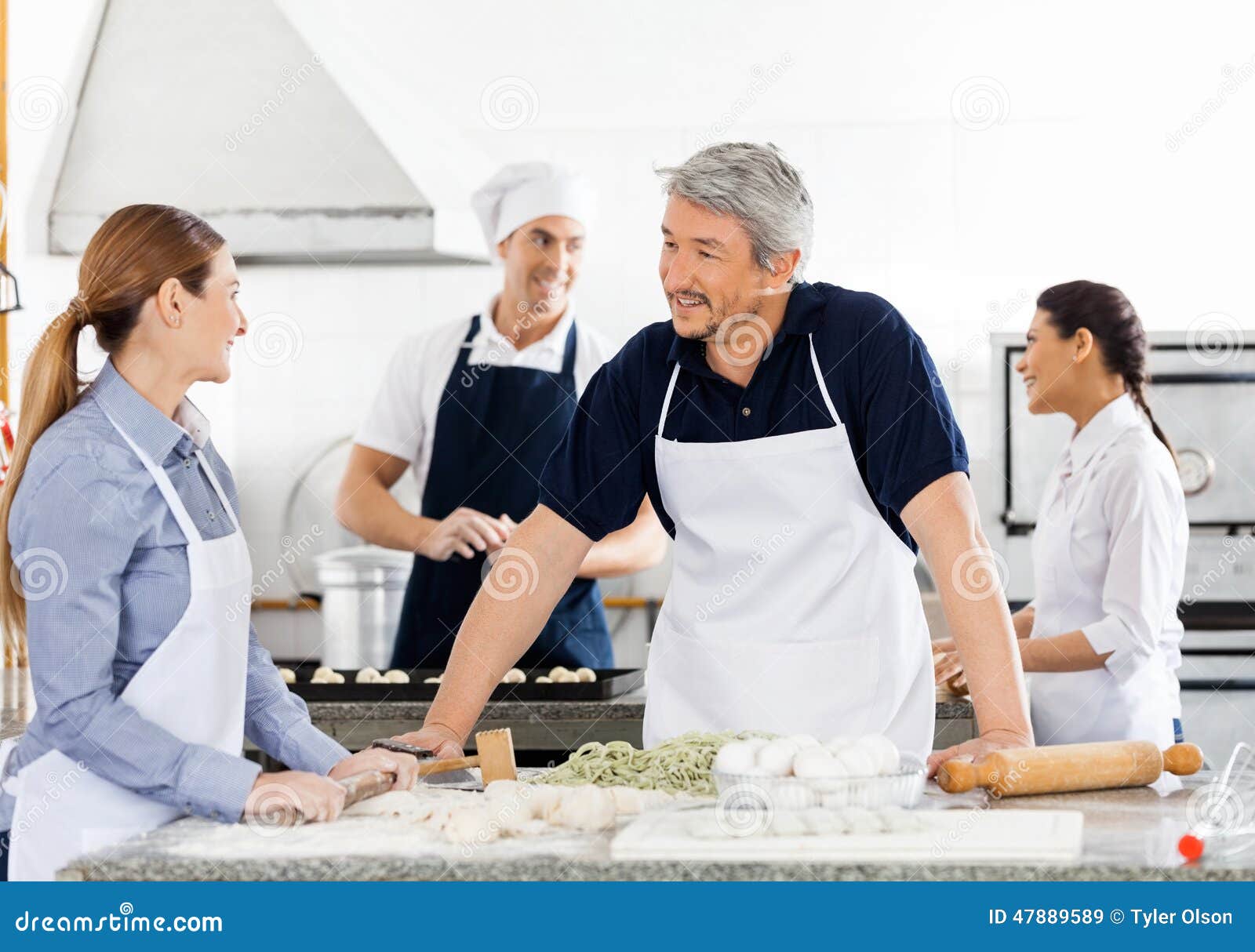 Chefs Talking while Preparing Pasta at Kitchen Stock Image - Image of ...