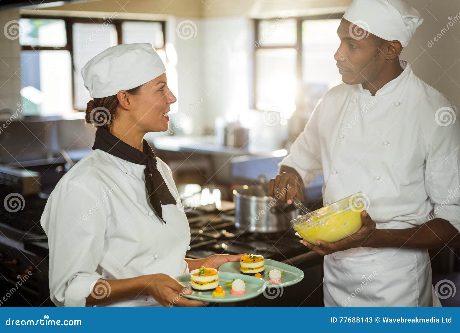 Chefs Talking To Each Other while Working in Kitchen Stock Image ...