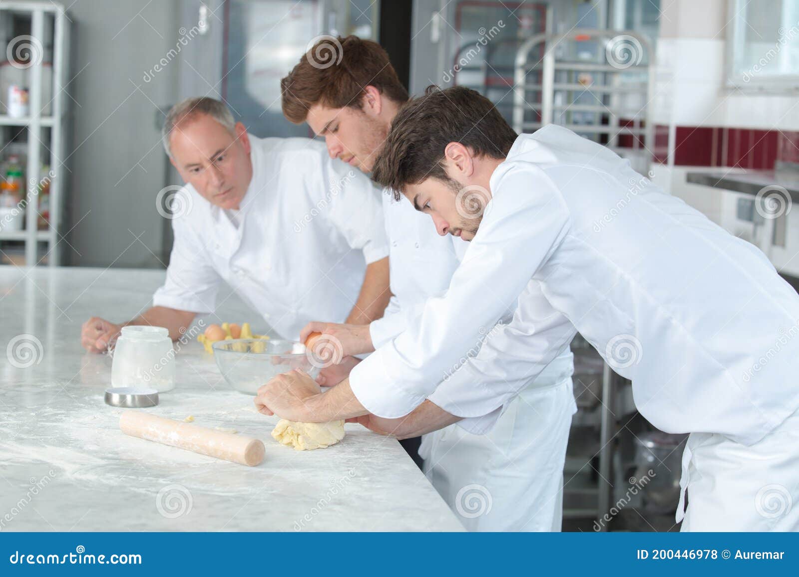 Chefs in Training Class Making Pastry Stock Photo - Image of bake, male ...