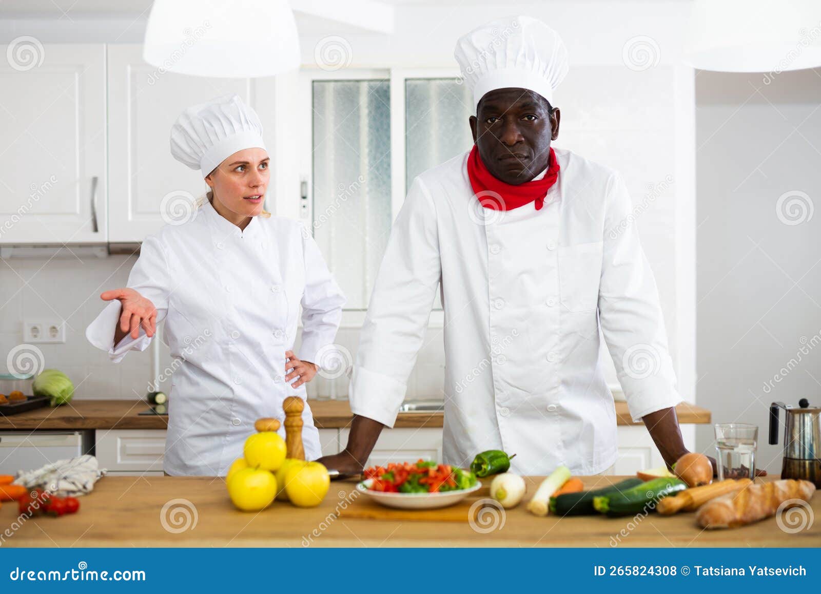 Chefs in White Uniform Having Conflict on Kitchen Stock Photo - Image ...