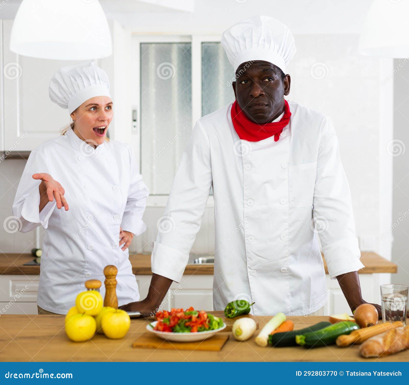 Chefs in White Uniform Having Conflict on Kitchen Stock Photo - Image ...