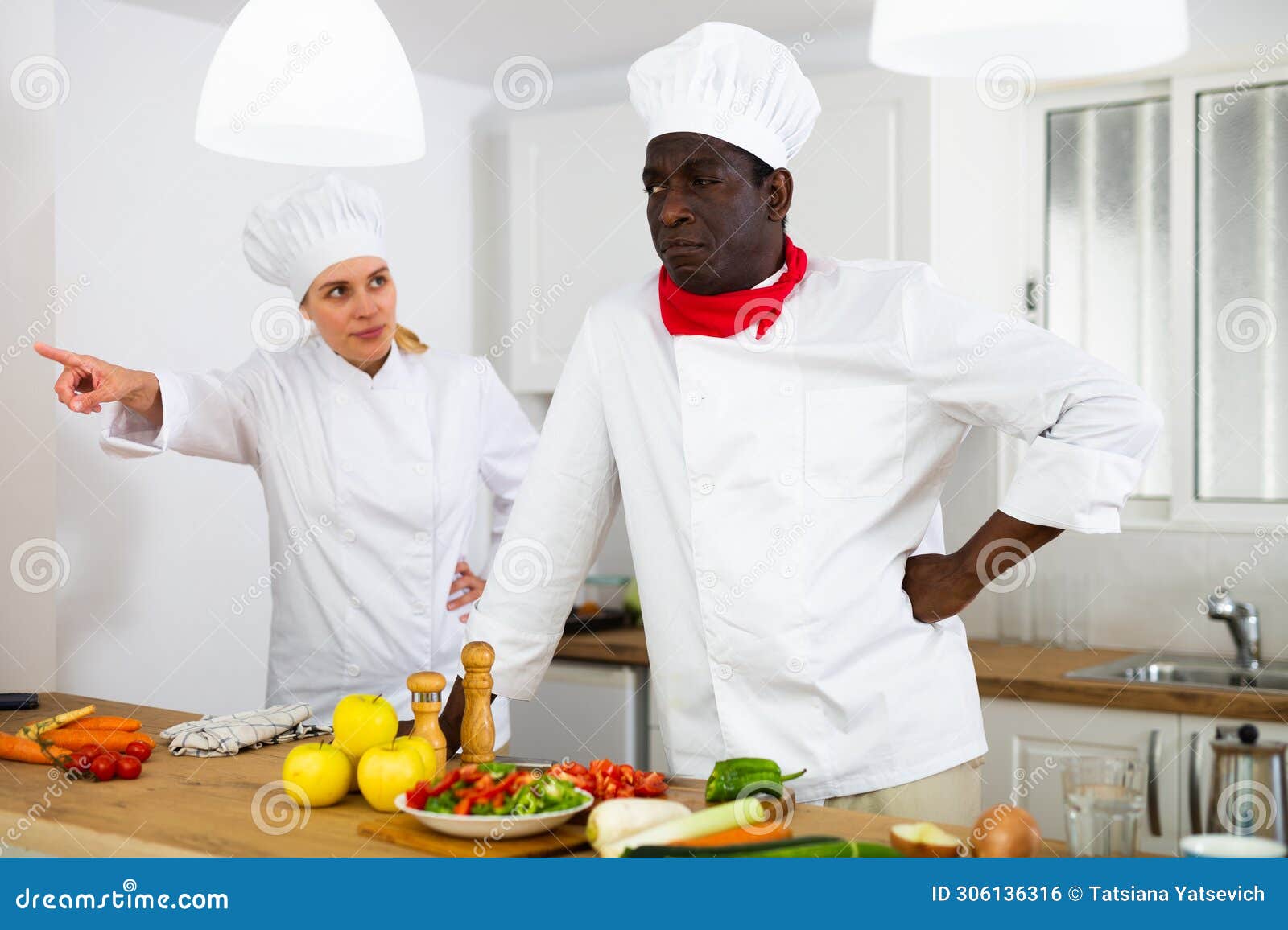Chefs in White Uniform Having Conflict on Kitchen Stock Photo - Image ...