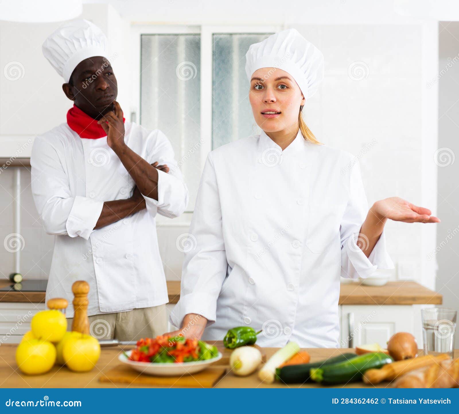 Chefs in White Uniform Having Conflict on Kitchen Stock Photo - Image ...