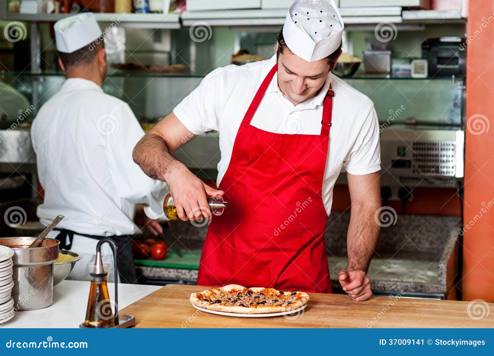 Chefs at Work Inside Restaurant Kitchen Stock Image - Image of ...