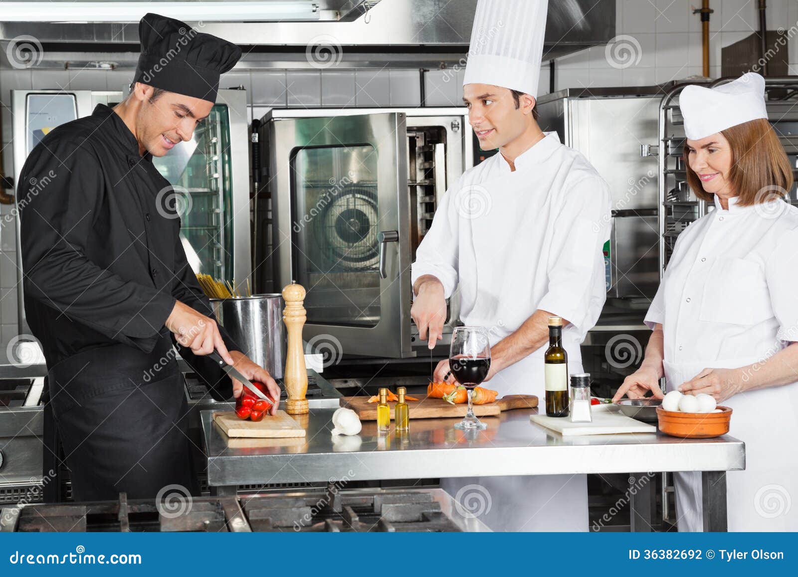 Chefs Working in Commercial Kitchen Stock Photo - Image of occupation ...