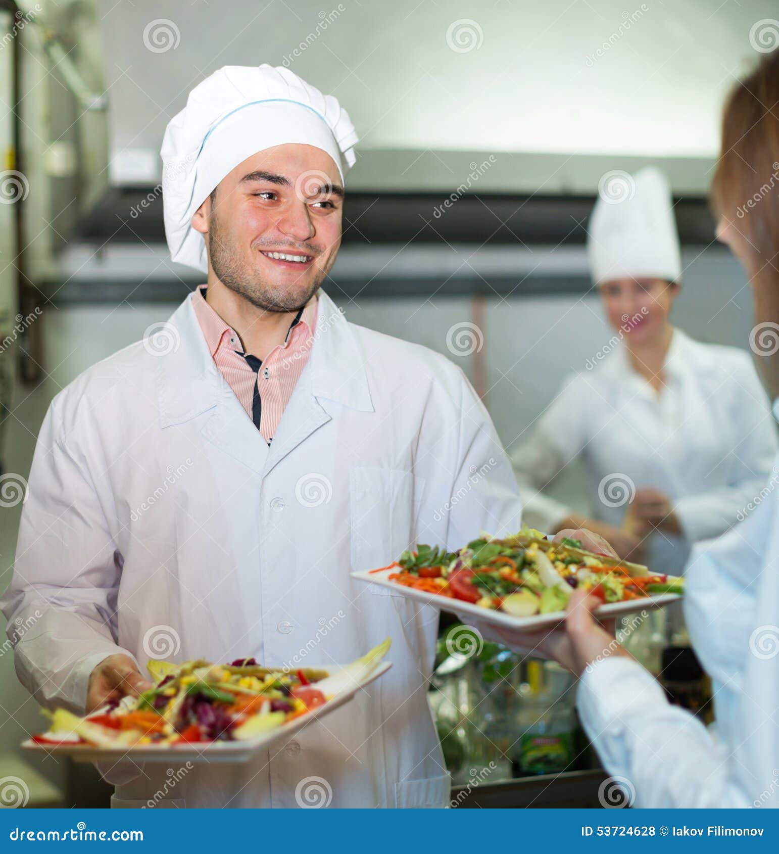Chefs and young waiter stock photo. Image of bistro, caucasian - 53724628