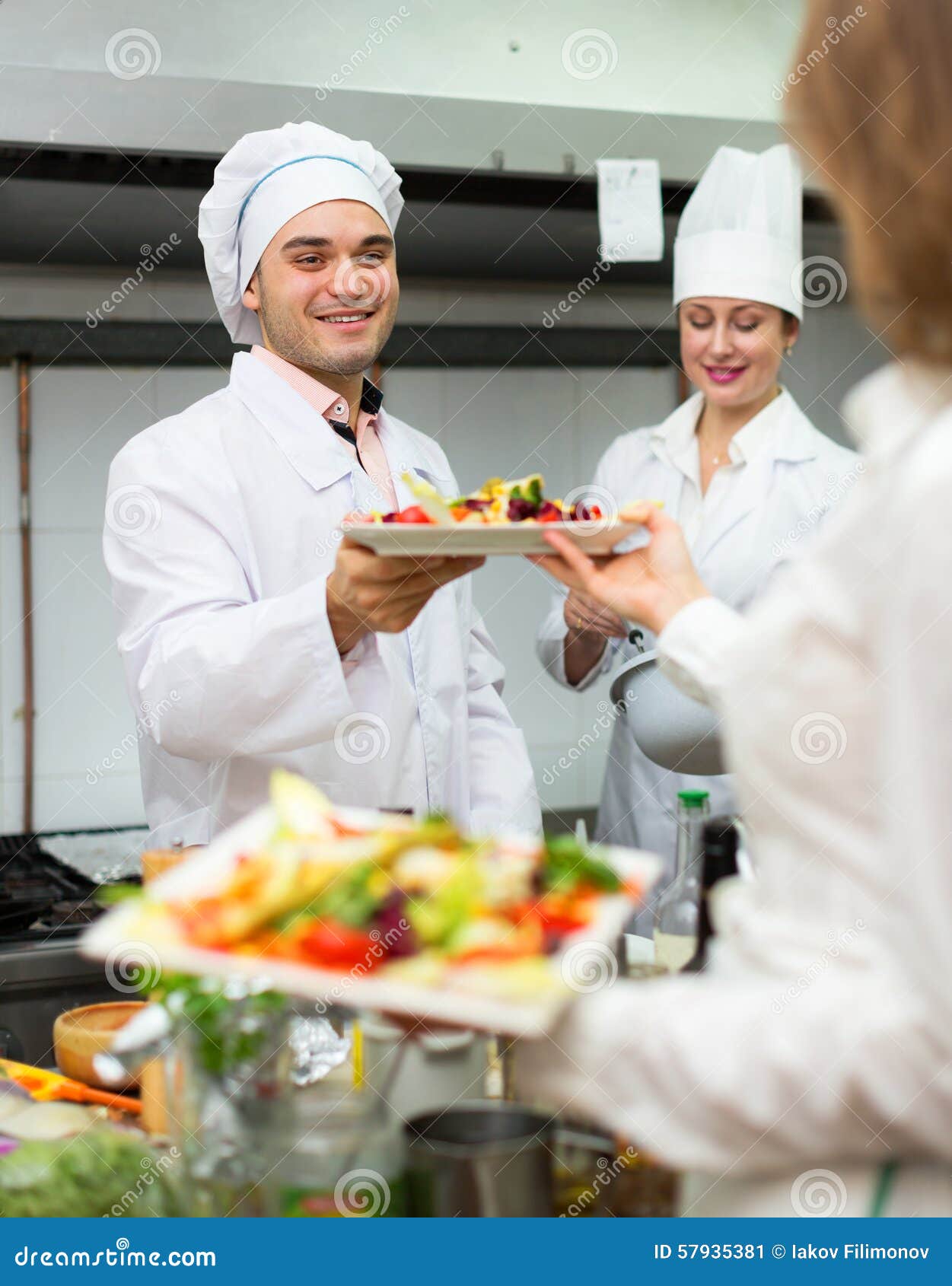 Chefs and young waiter stock image. Image of cafeteria - 57935381