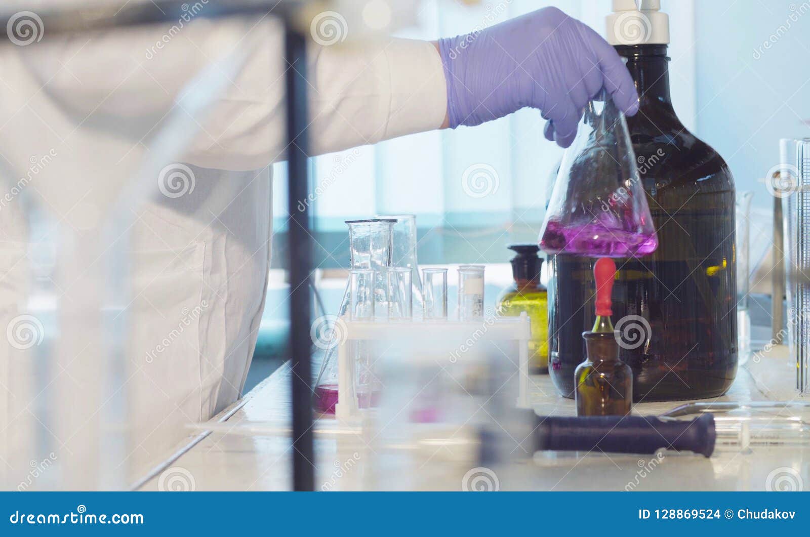 Chemical Analysis Laboratory. Hands of a Scientist Titrating Solution ...