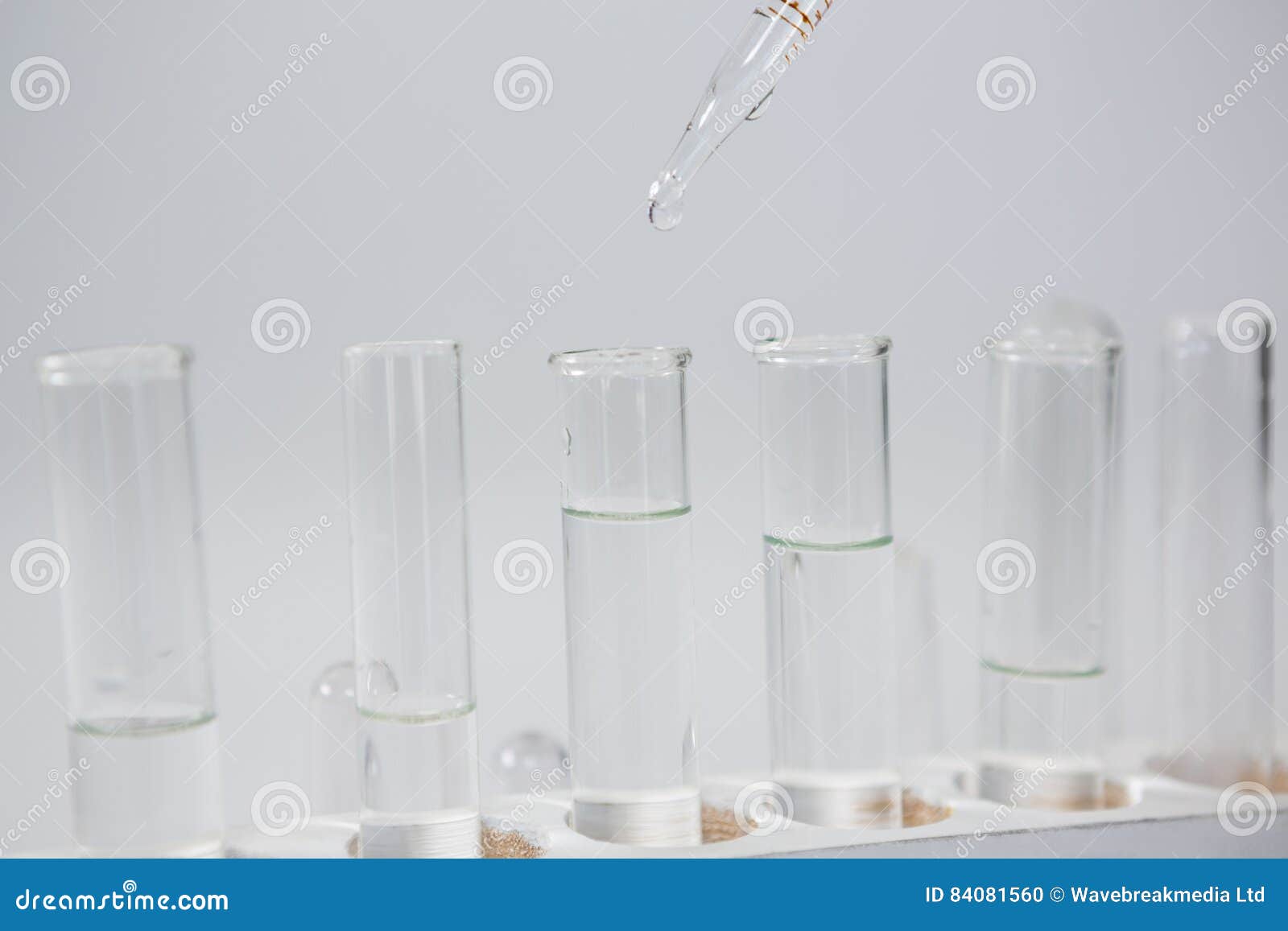 Chemical Being Drop into Test Tubes Stock Photo - Image of medical ...