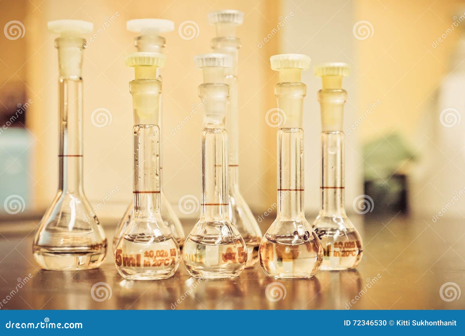 Chemical Bottles on Table in Laboratory Stock Photo - Image of indoors ...