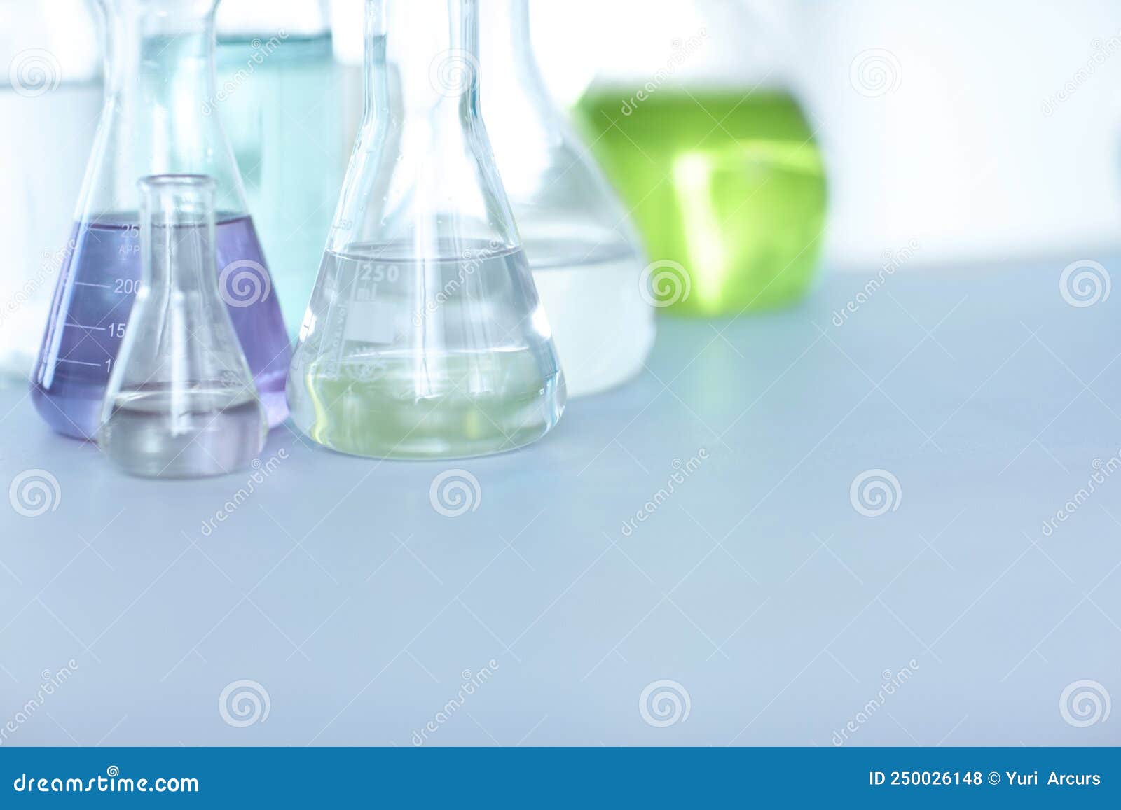 Chemical Compounds. Vials Filled with Colourful Liquid on a Table in a ...