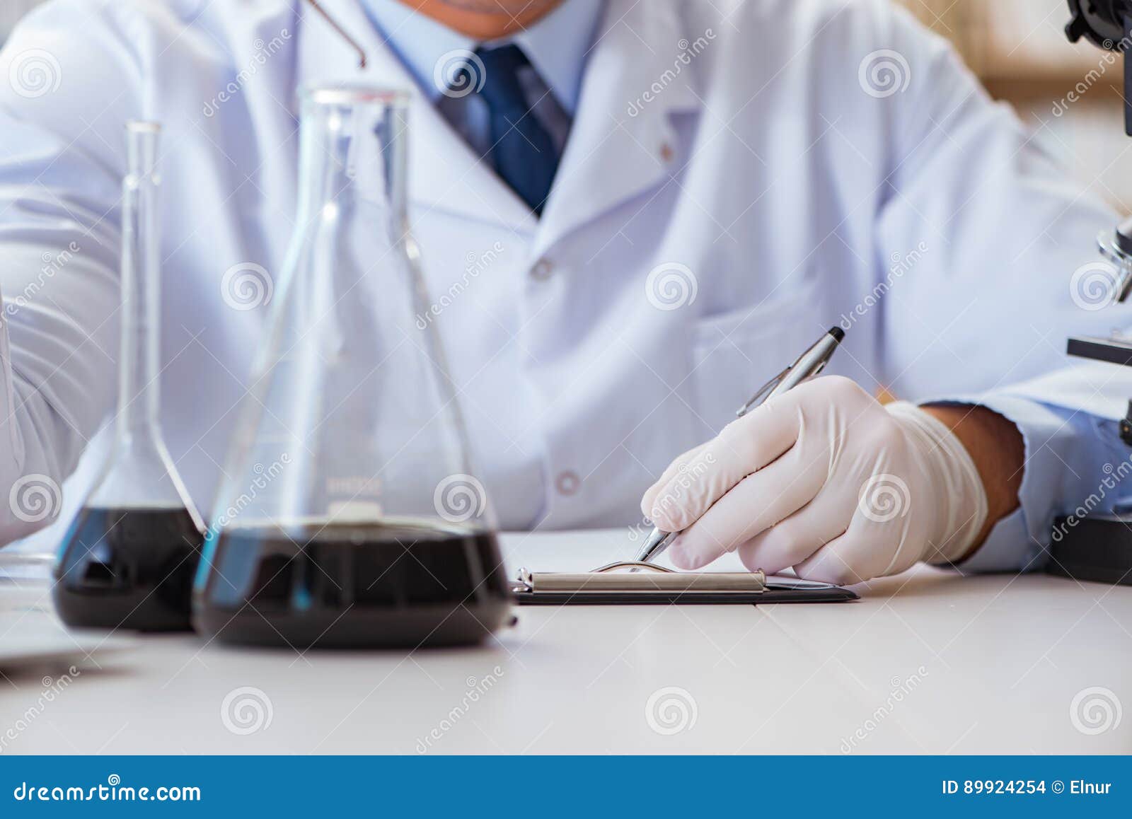 The Chemical Engineer Working on Oil Samples in Lab Stock Photo - Image ...