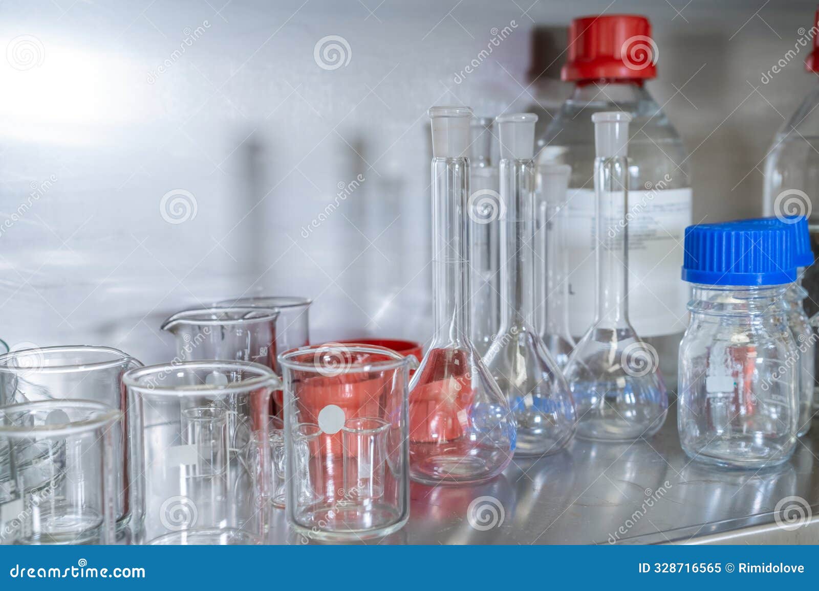 Chemical Glassware Flasks, Beakers and Bottles in the Laboratory Stock ...