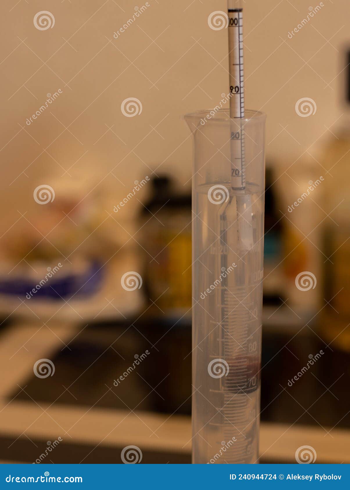 Measuring Alcohol with a Thermometer Stock Photo - Image of spirit ...