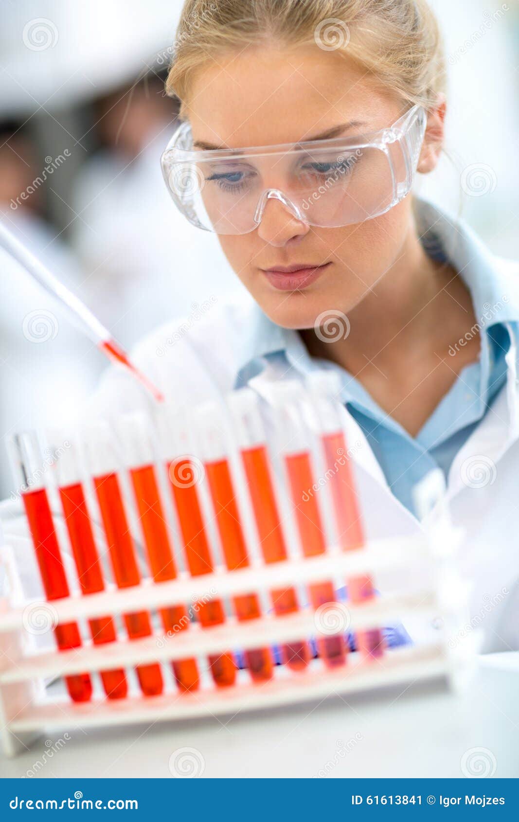 Chemical Technician Analyzing Fluid in Test Tubes Stock Image - Image ...