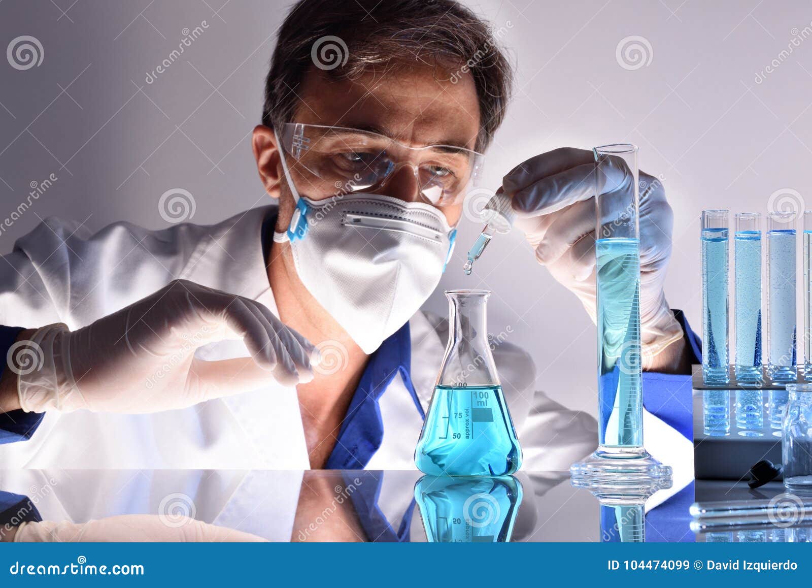 Chemical Worker Testing Different Substances Behind a Laboratory Stock ...