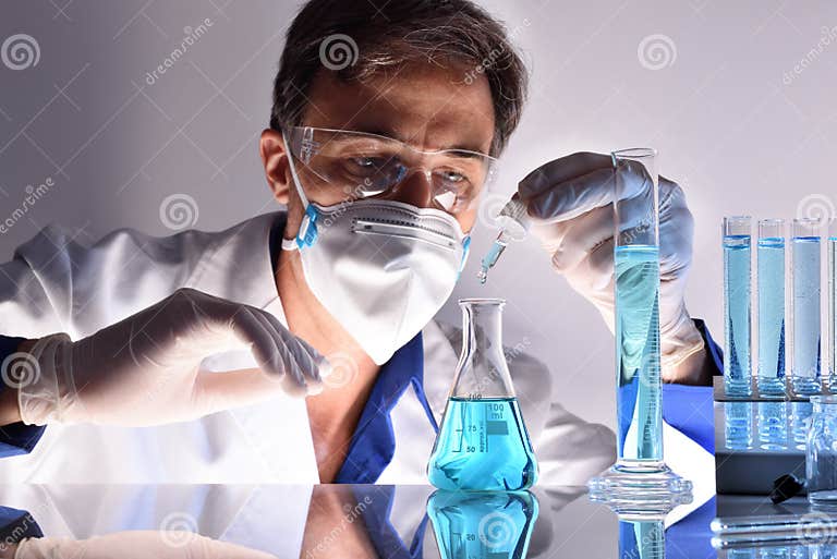 Chemical Worker Testing Different Substances Behind a Laboratory Stock ...