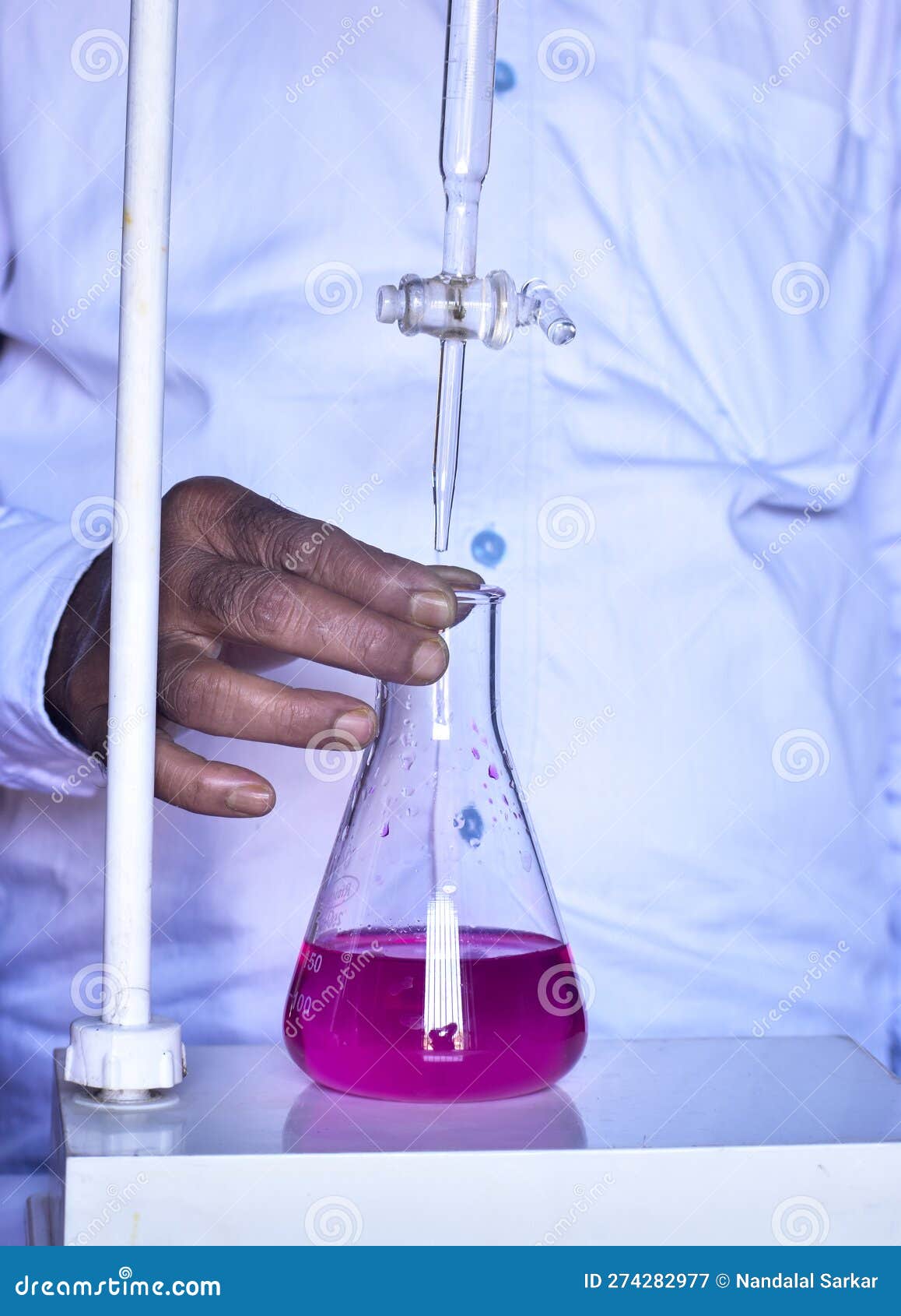 The Chemist Conducts Acid-base Titration, Accurately Measuring and ...
