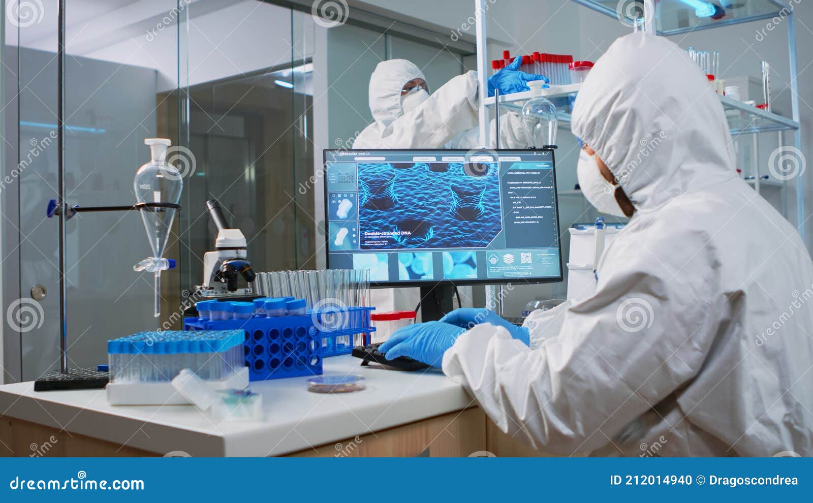 Chemist In Coverall Typing On Computer Analysing Vaccine Evolution ...