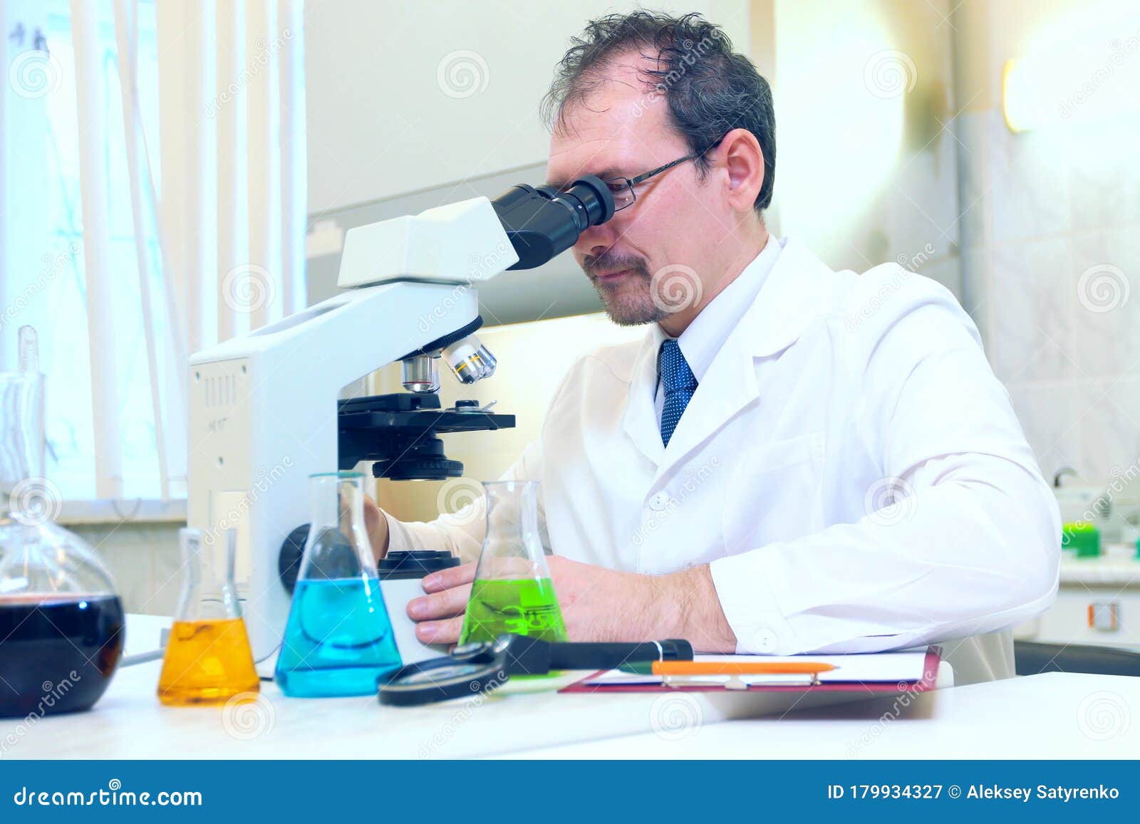 Chemist Crazy. a Mad Scientist Conducts Experiments in a Scienti Stock ...