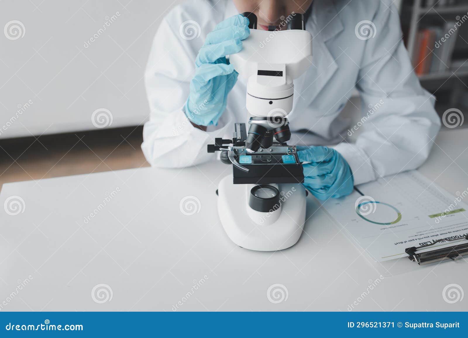 Chemist Is Doing An Experiment In The Laboratory, A Scientist Is Using ...