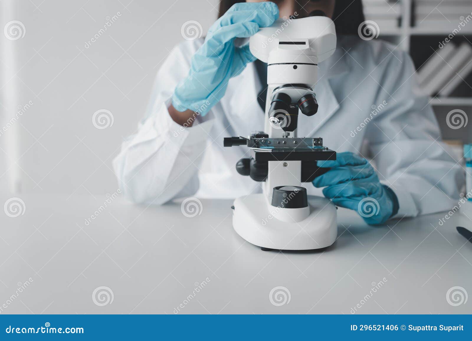 Chemist is Doing an Experiment in the Laboratory, a Scientist is Using ...