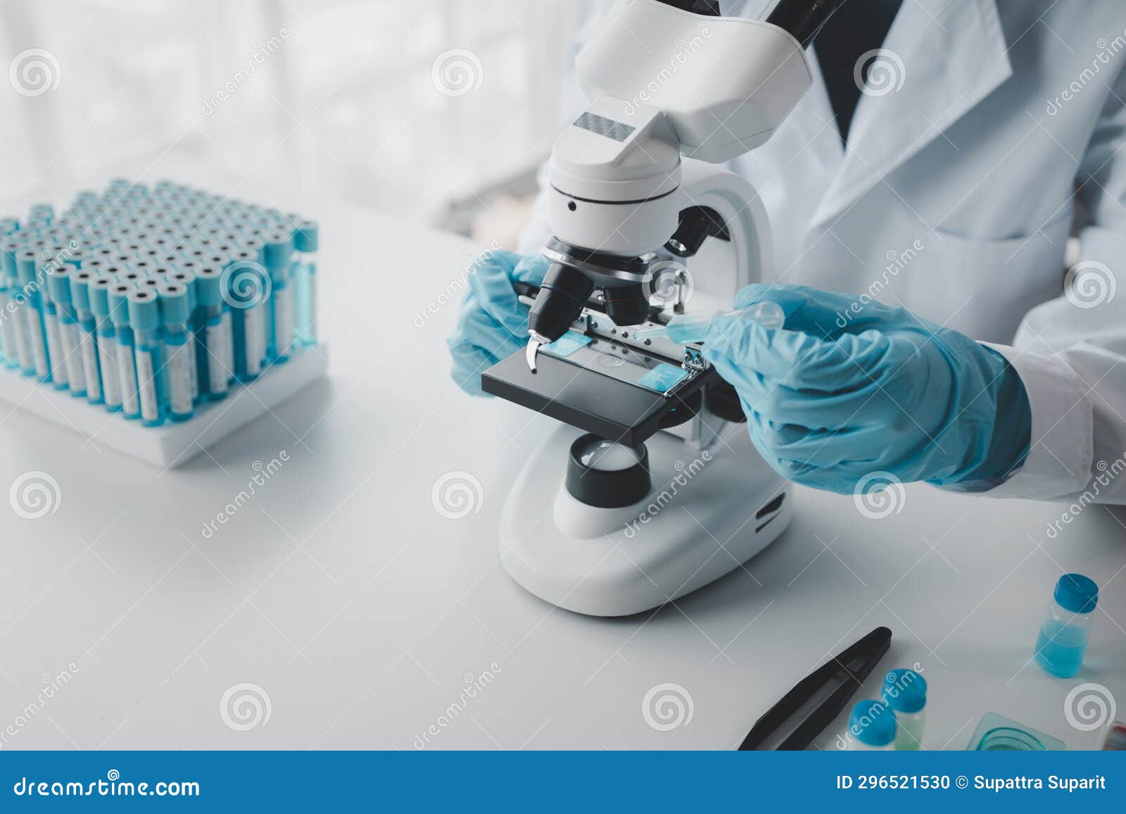 Chemist Is Doing An Experiment In The Laboratory, A Scientist Is Using ...