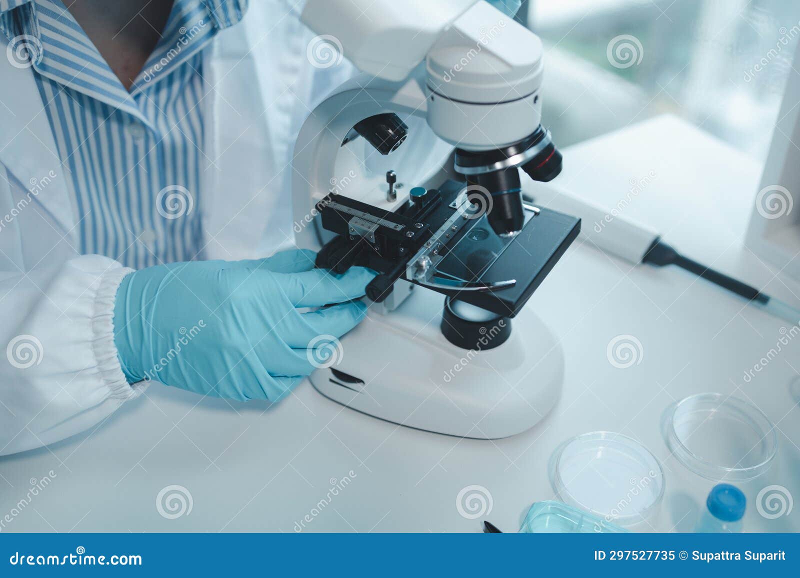 Chemist Is Doing An Experiment In The Laboratory, A Scientist Is Using ...