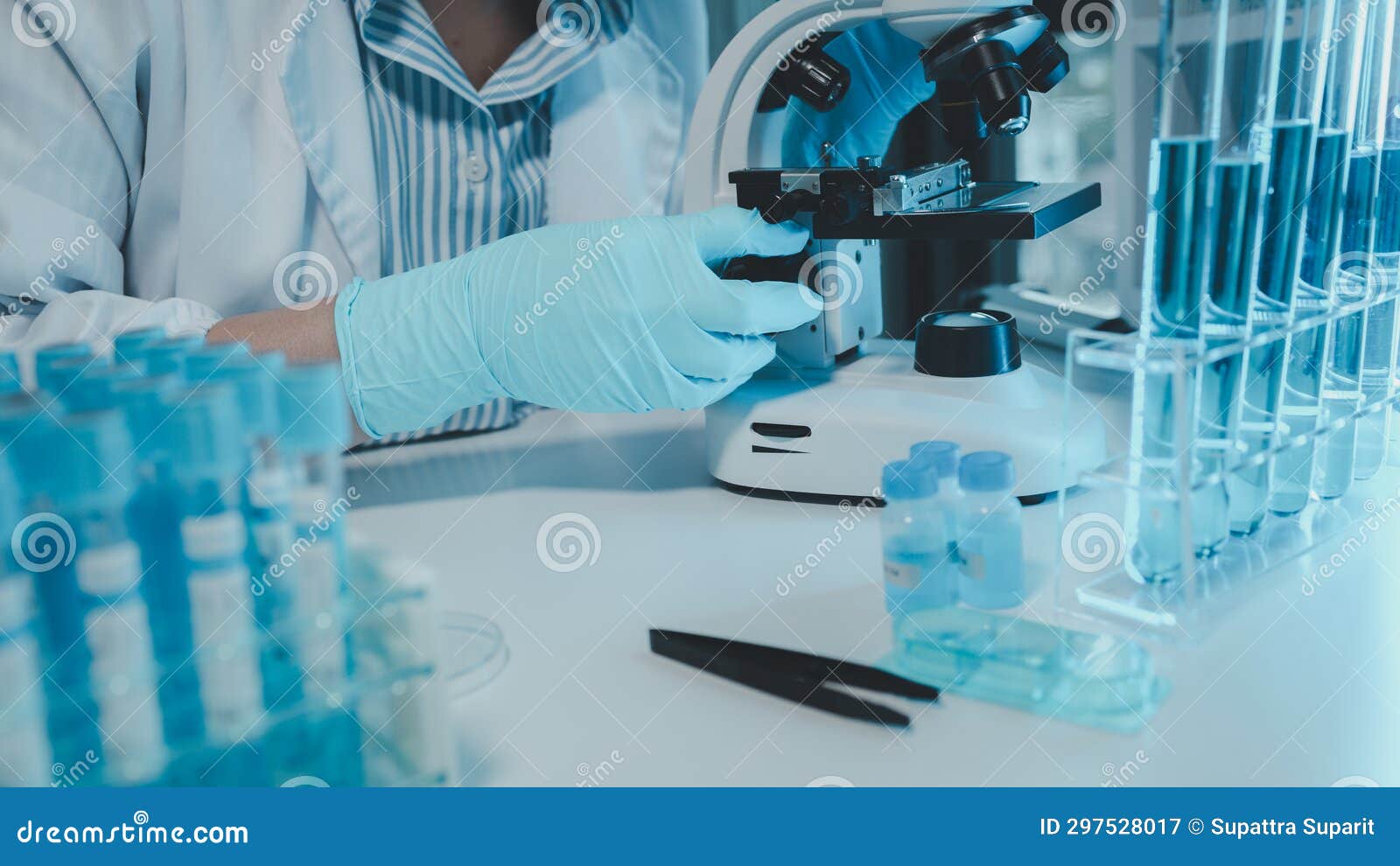 Chemist is Doing an Experiment in the Laboratory, a Scientist is Using ...