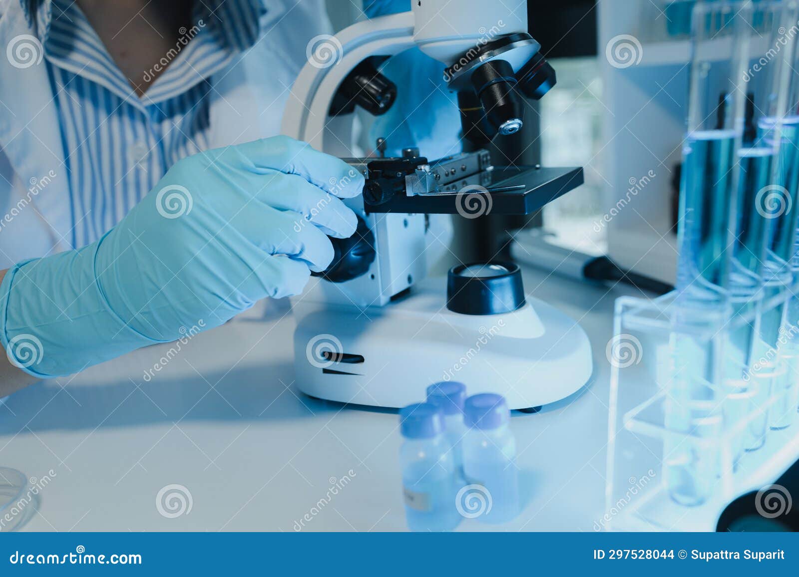 Chemist is Doing an Experiment in the Laboratory, a Scientist is Using ...