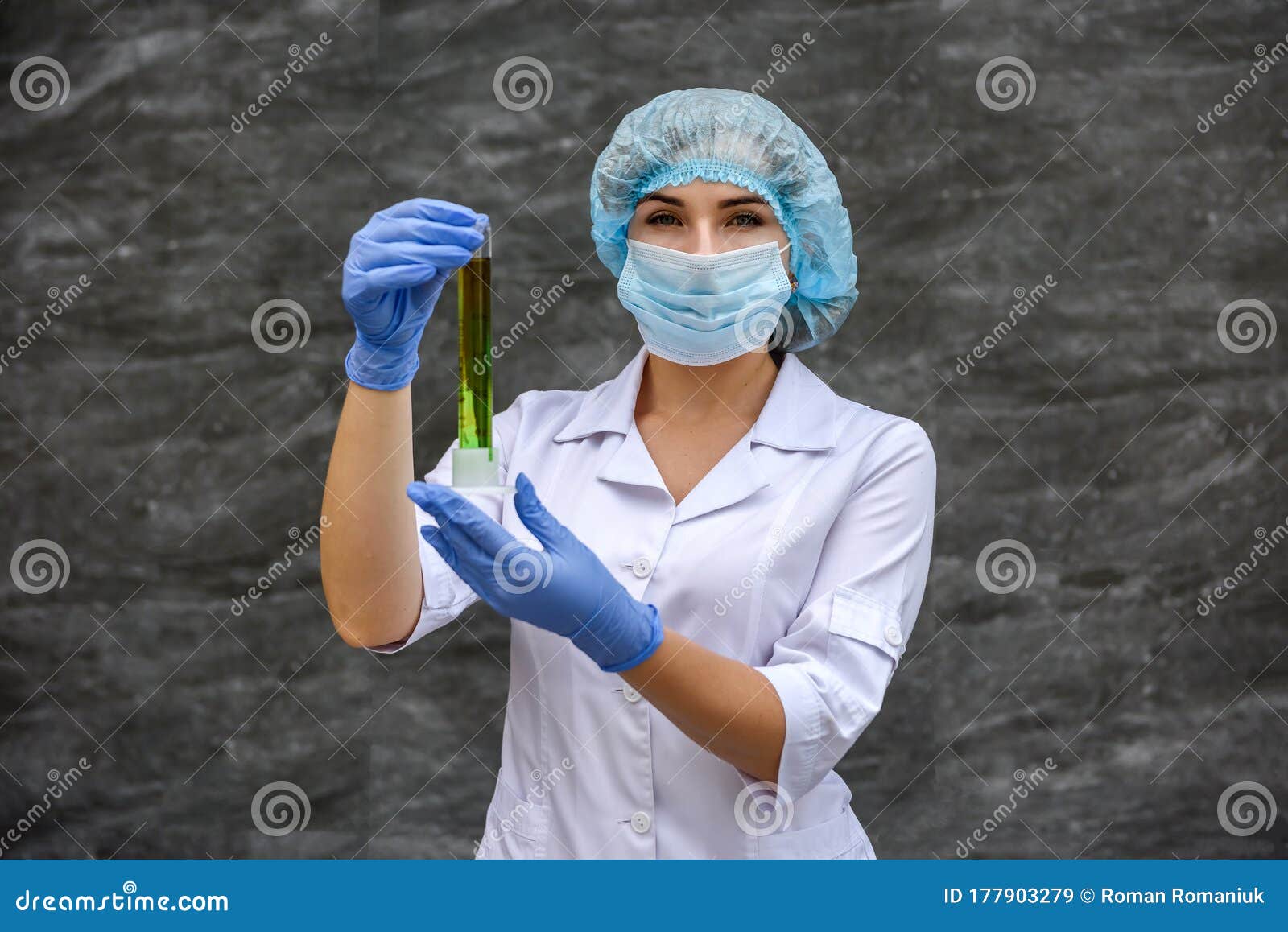 Chemist with Flask Making Scientific Experiment. she`s in Protective ...