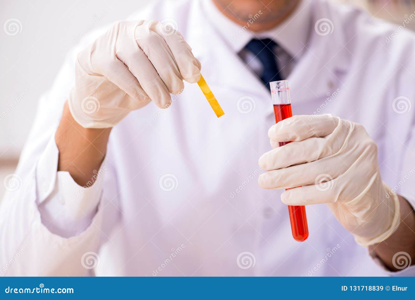 The Chemist in the Lab Checking with Ph Strips Stock Image - Image of ...