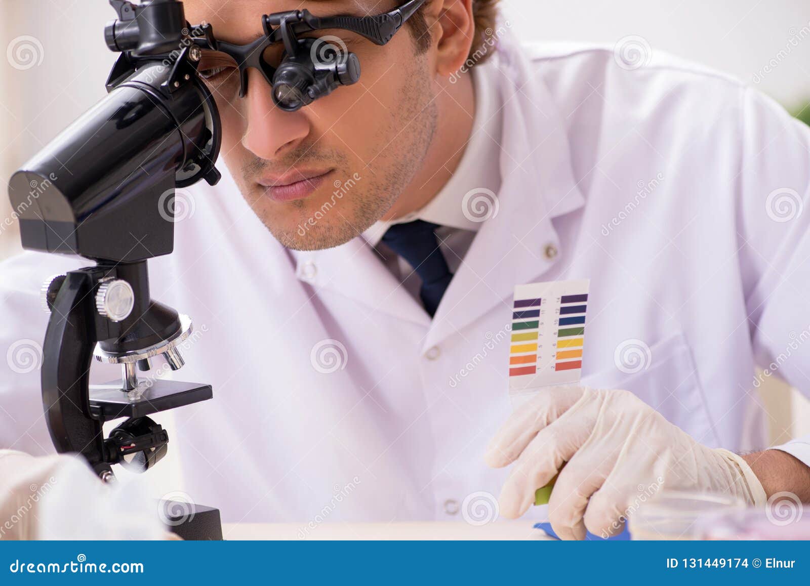 The Chemist in the Lab Checking with Ph Strips Stock Photo - Image of ...