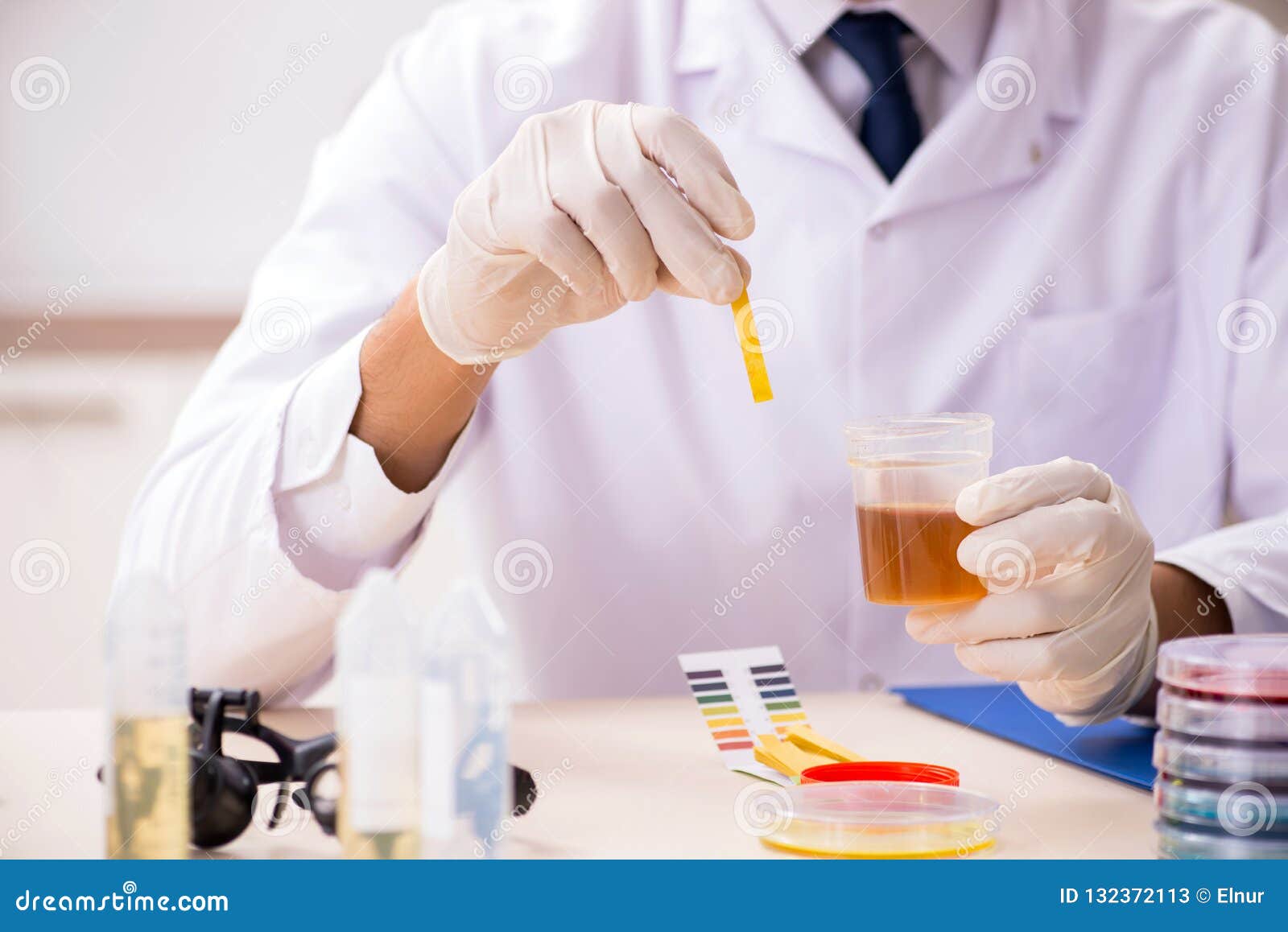 The Chemist in the Lab Checking with Ph Strips Stock Image - Image of ...