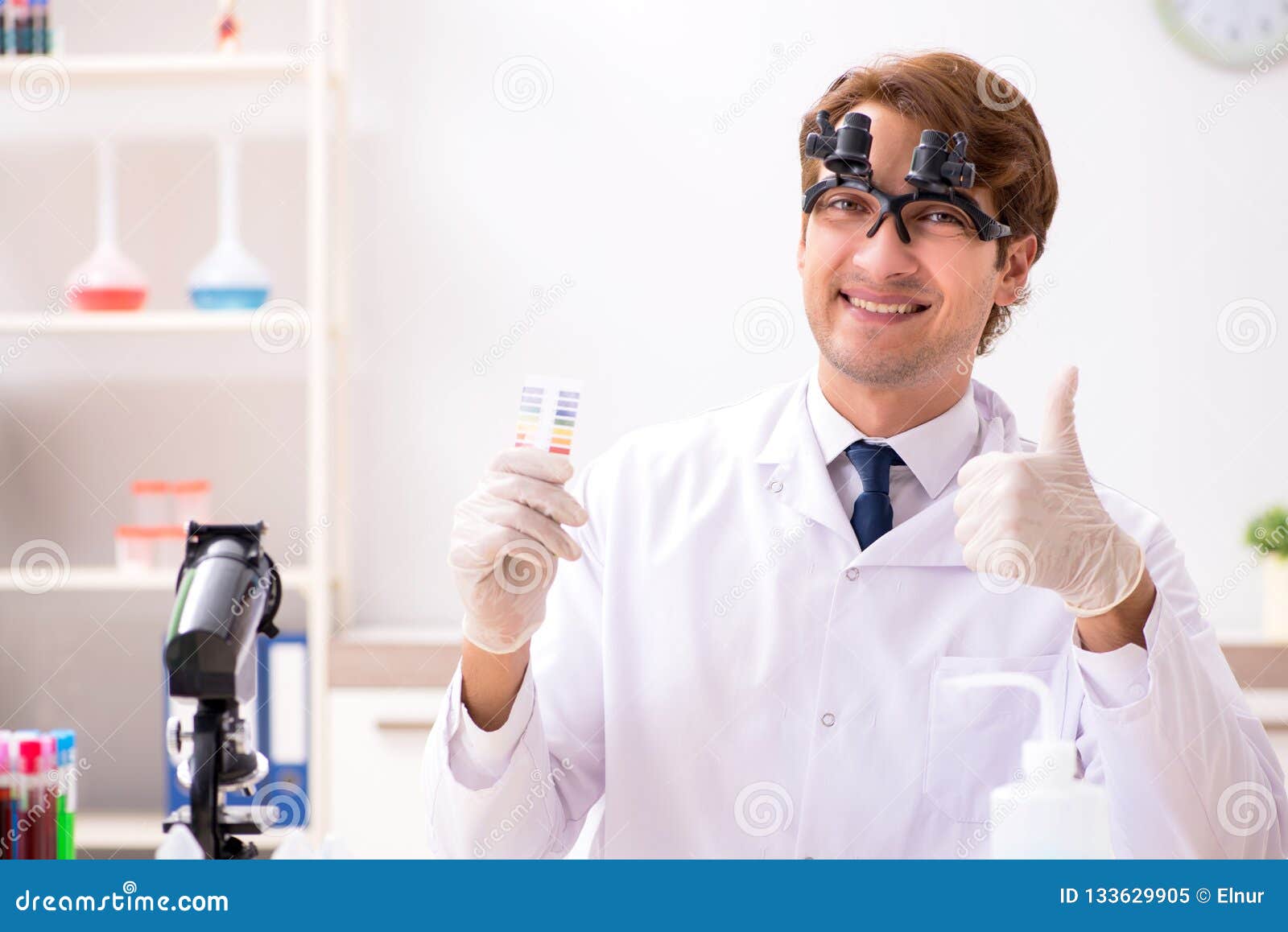 The Chemist in the Lab Checking with Ph Strips Stock Image - Image of ...