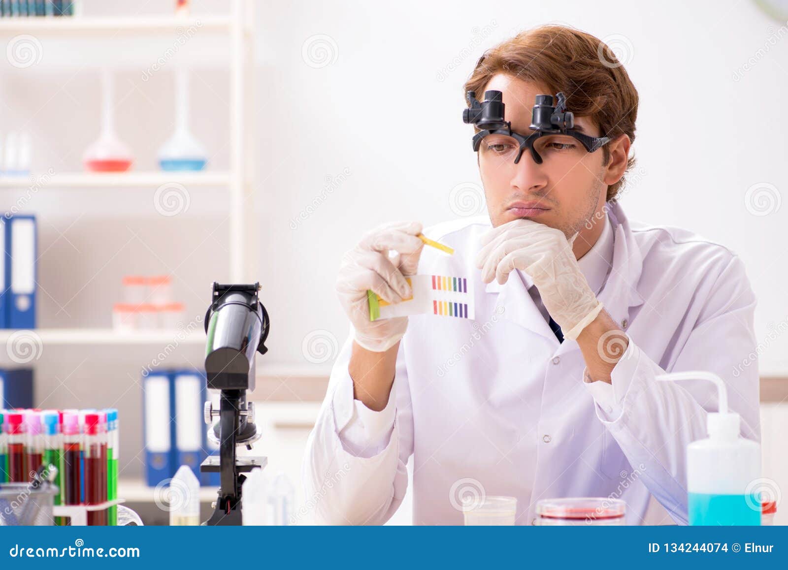 The Chemist in the Lab Checking with Ph Strips Stock Photo - Image of ...
