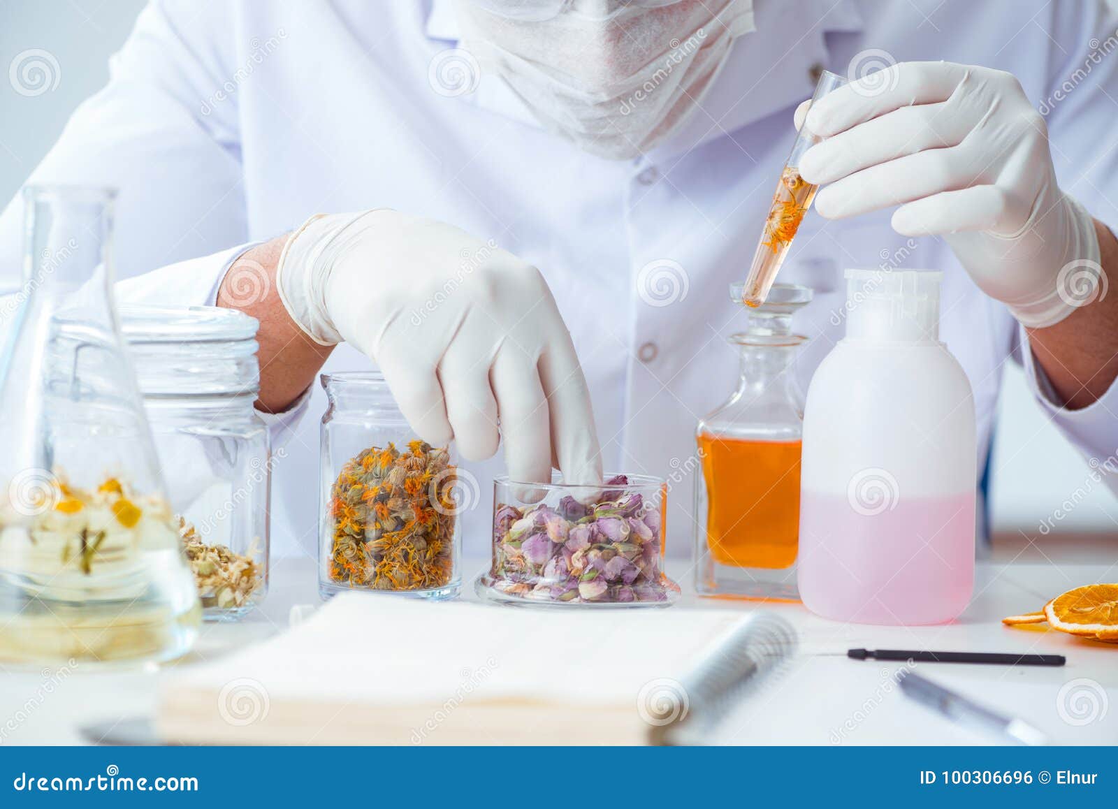 The Chemist Mixing Perfumes in the Lab Stock Photo - Image of ...