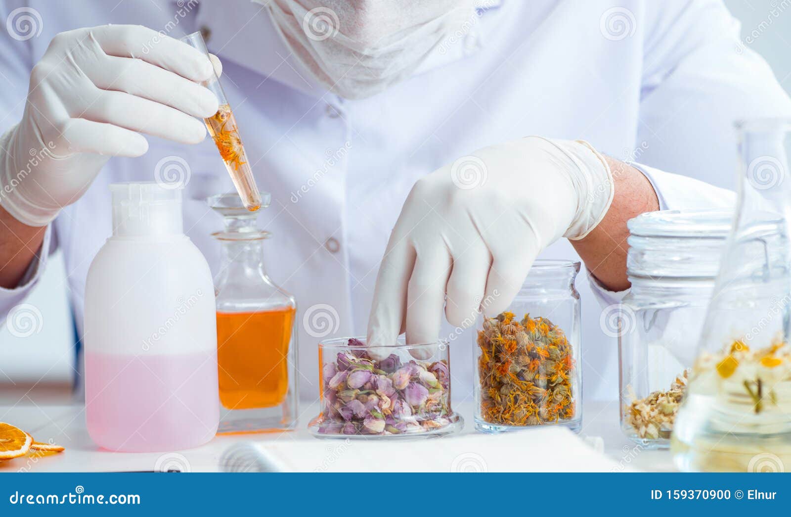 Chemist Mixing Perfumes in the Lab Stock Photo - Image of fragrance ...