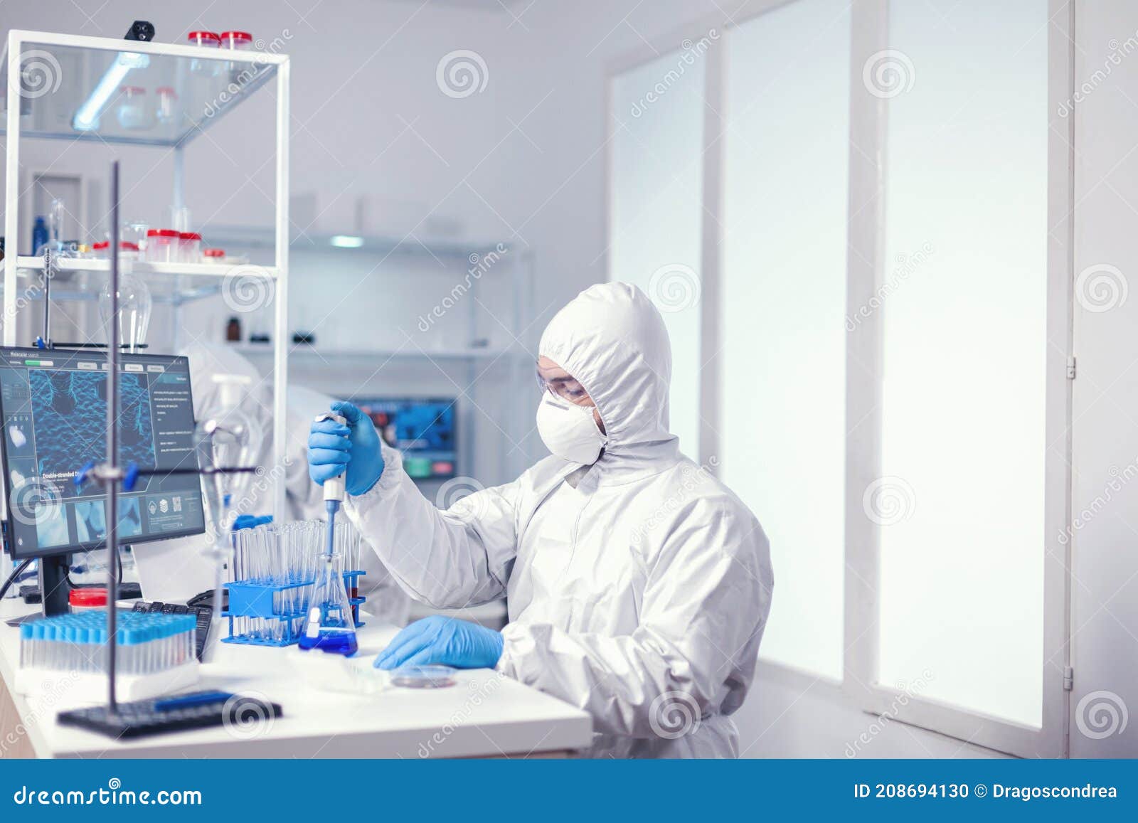Chemist in Modern Laboratory Doing Research Using Dispenser Stock Photo ...