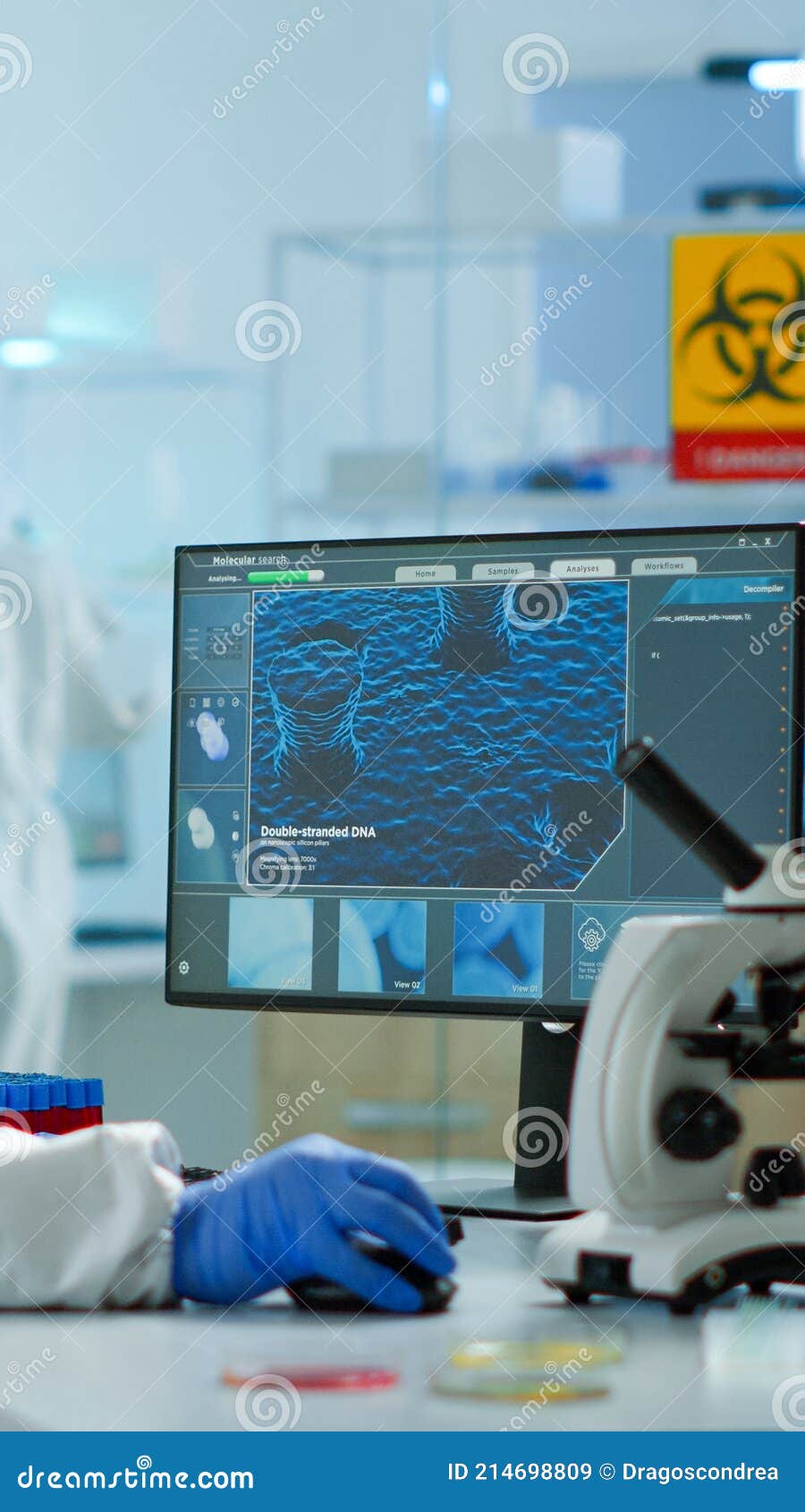 Chemist In Ppe Suit Typing On Computer Checking Vaccine Development ...